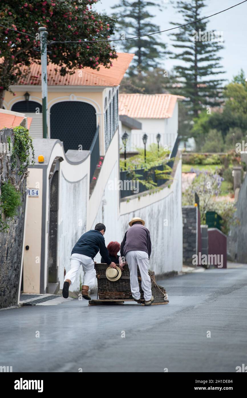 a traditional Monte sledge on the way from Monte to Funchal the city ...