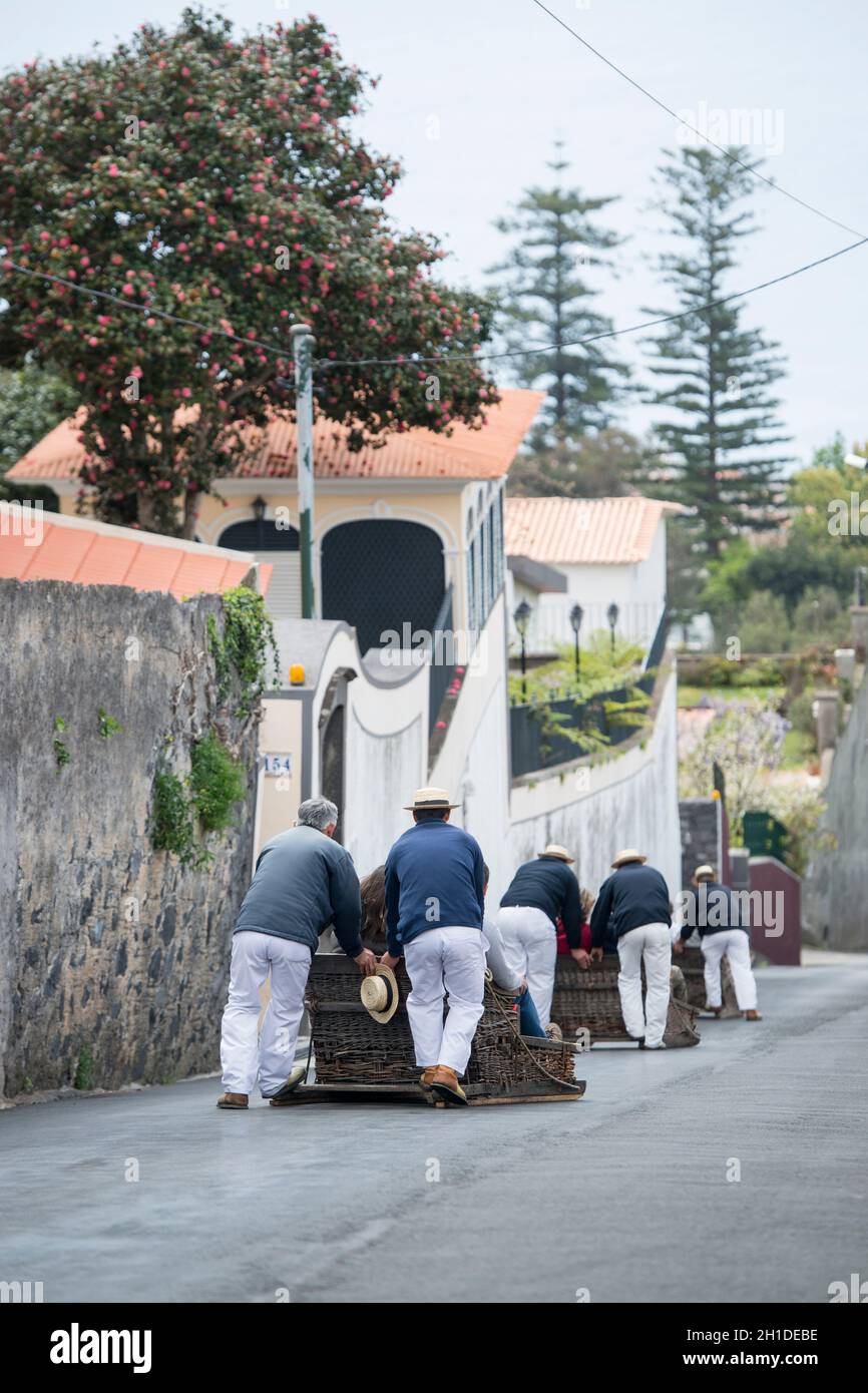 a traditional Monte sledge on the way from Monte to Funchal the city ...