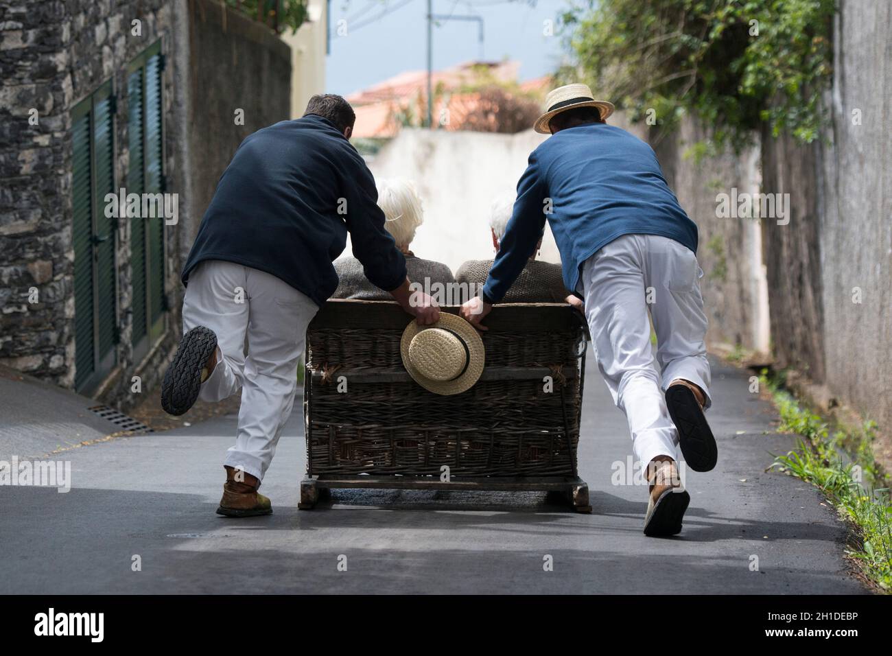 a traditional Monte sledge on the way from Monte to Funchal the city ...