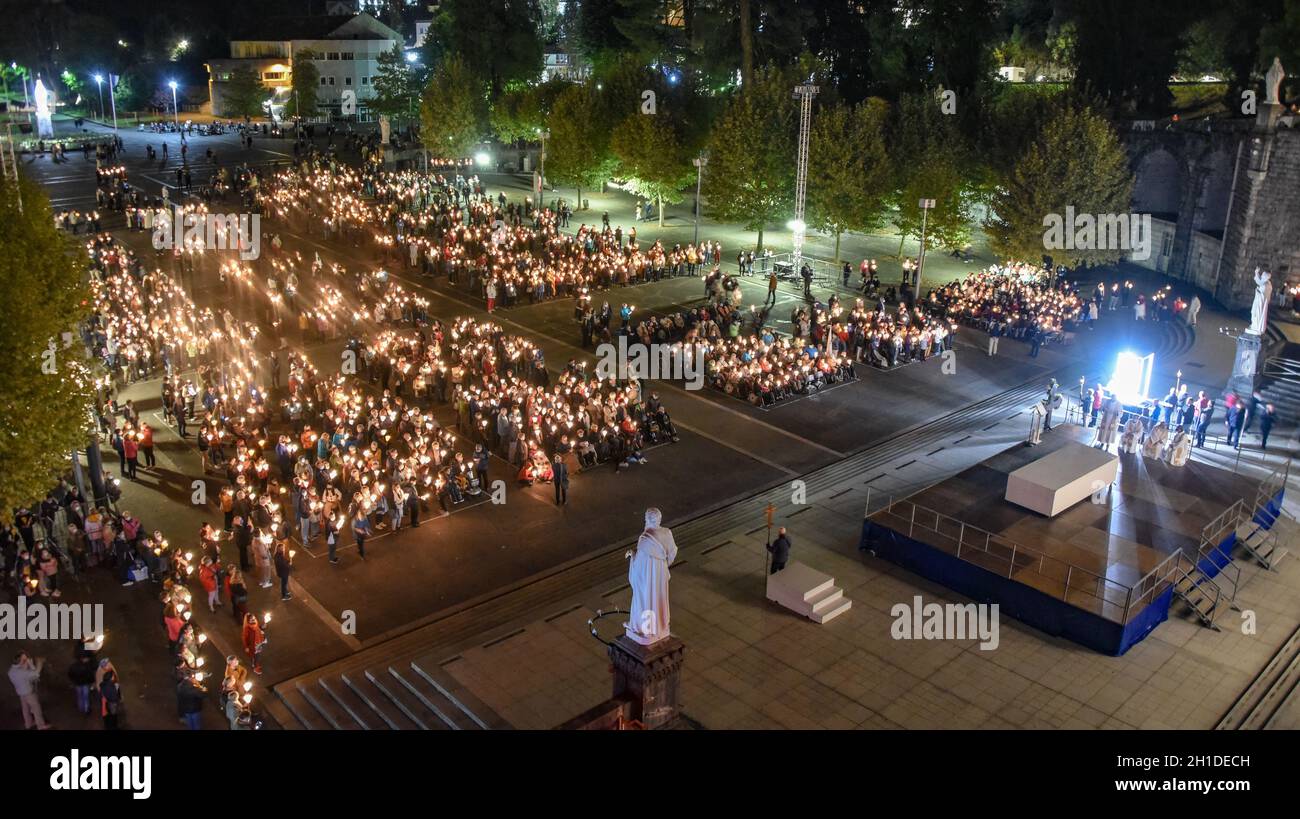 Lourdes, France - 9 Oct 2021: Pilgrims attend the Marian Torchlight ...
