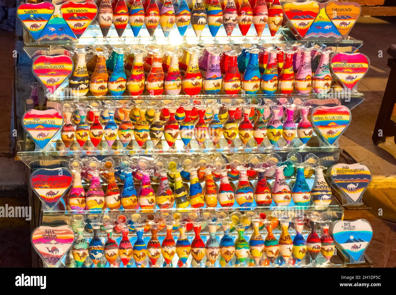 Decorative Glass Bottles with Colored Sand Inside and Shapes of Desert ...