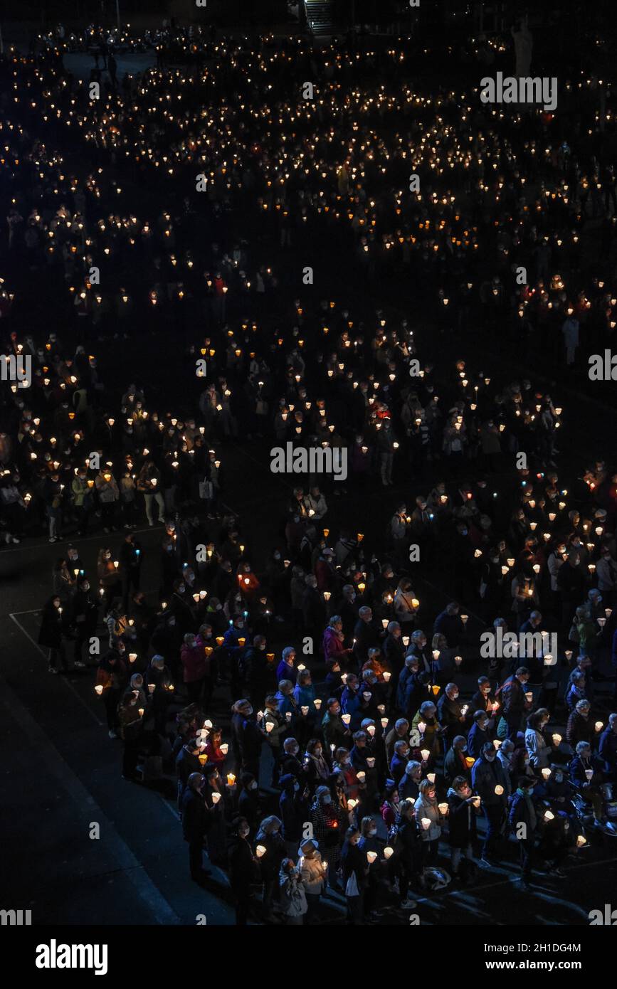 Lourdes, France - 9 Oct 2021: Pilgrims attend the Marian Torchlight ...