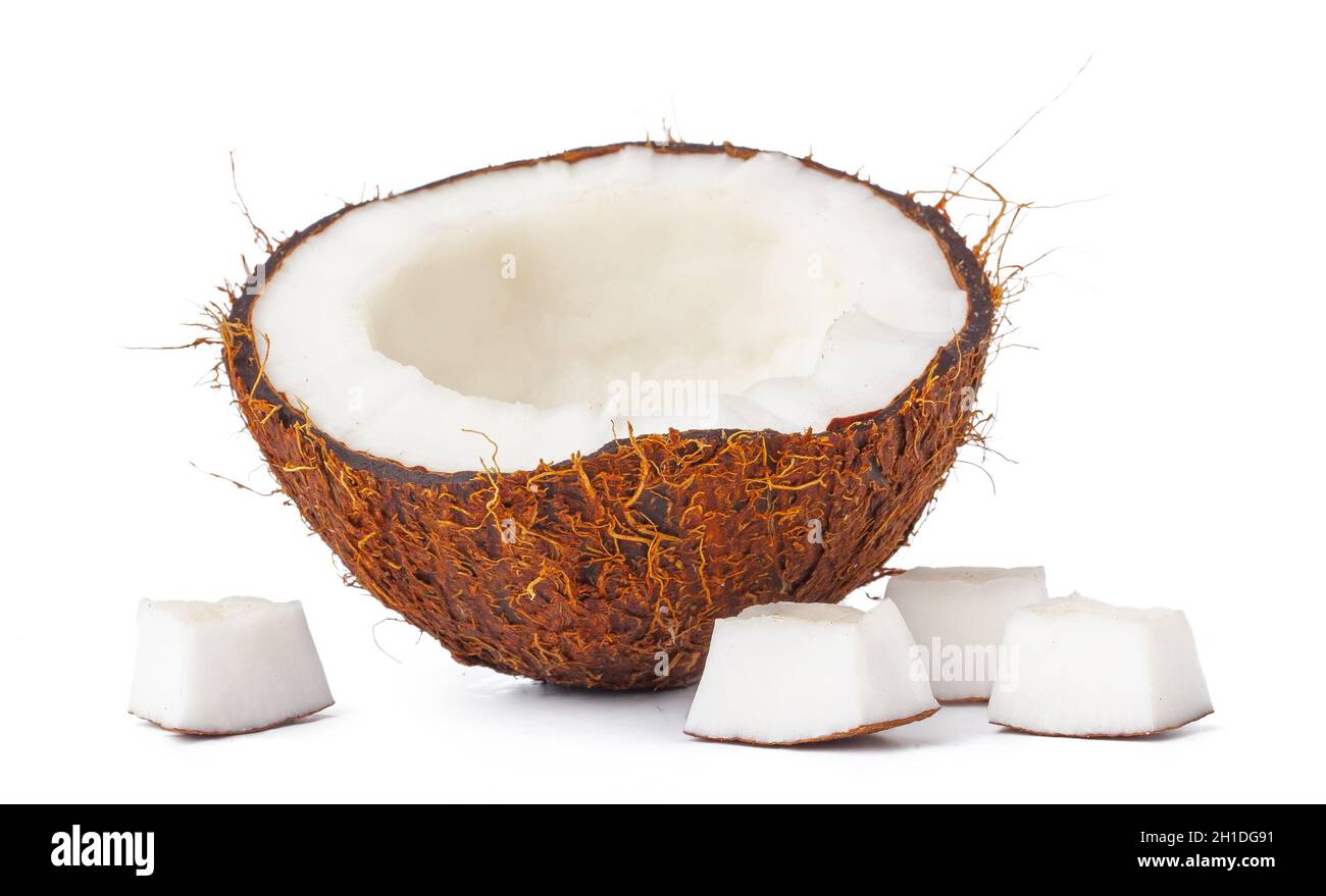 Coco nut halves isolated on white background Stock Photo - Alamy