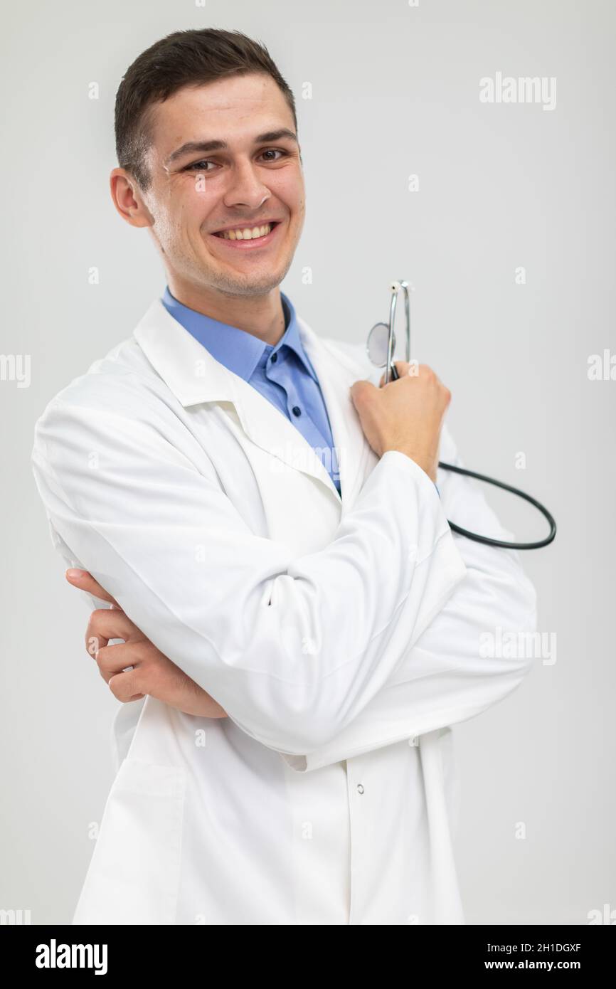 Male doctor standing facing camera hi-res stock photography and images ...