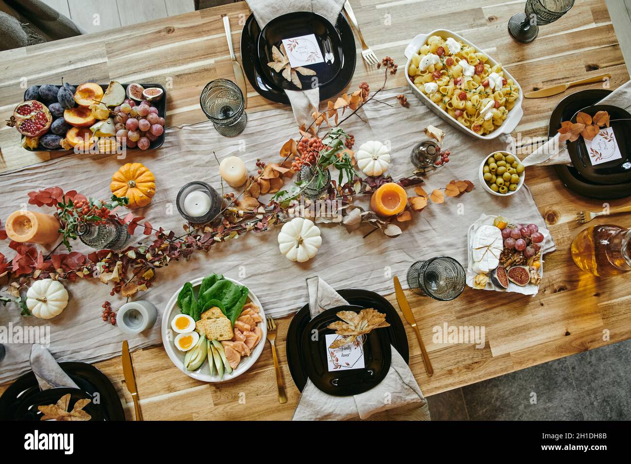 High angle view of different appetizers serving on dining table ...