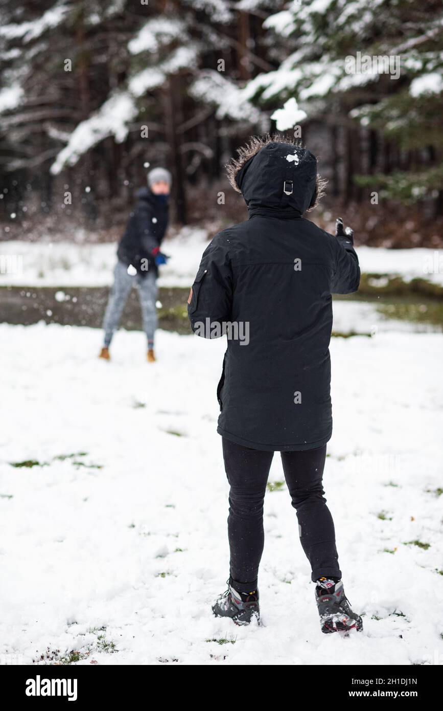 Throwing snow balls hi-res stock photography and images - Alamy
