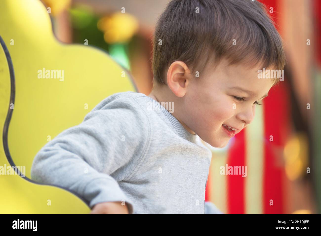 Playground spring rocker High Resolution Stock Photography and Images ...