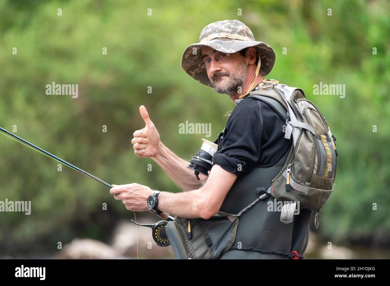 Happy fisherman hi-res stock photography and images - Alamy