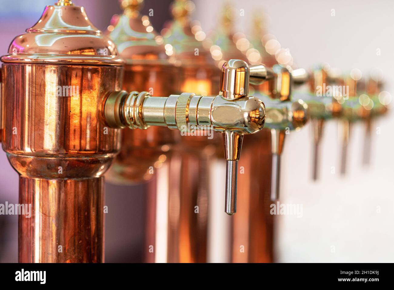 Shiny beer tap ready to serve cold beer at the bar Stock Photo - Alamy