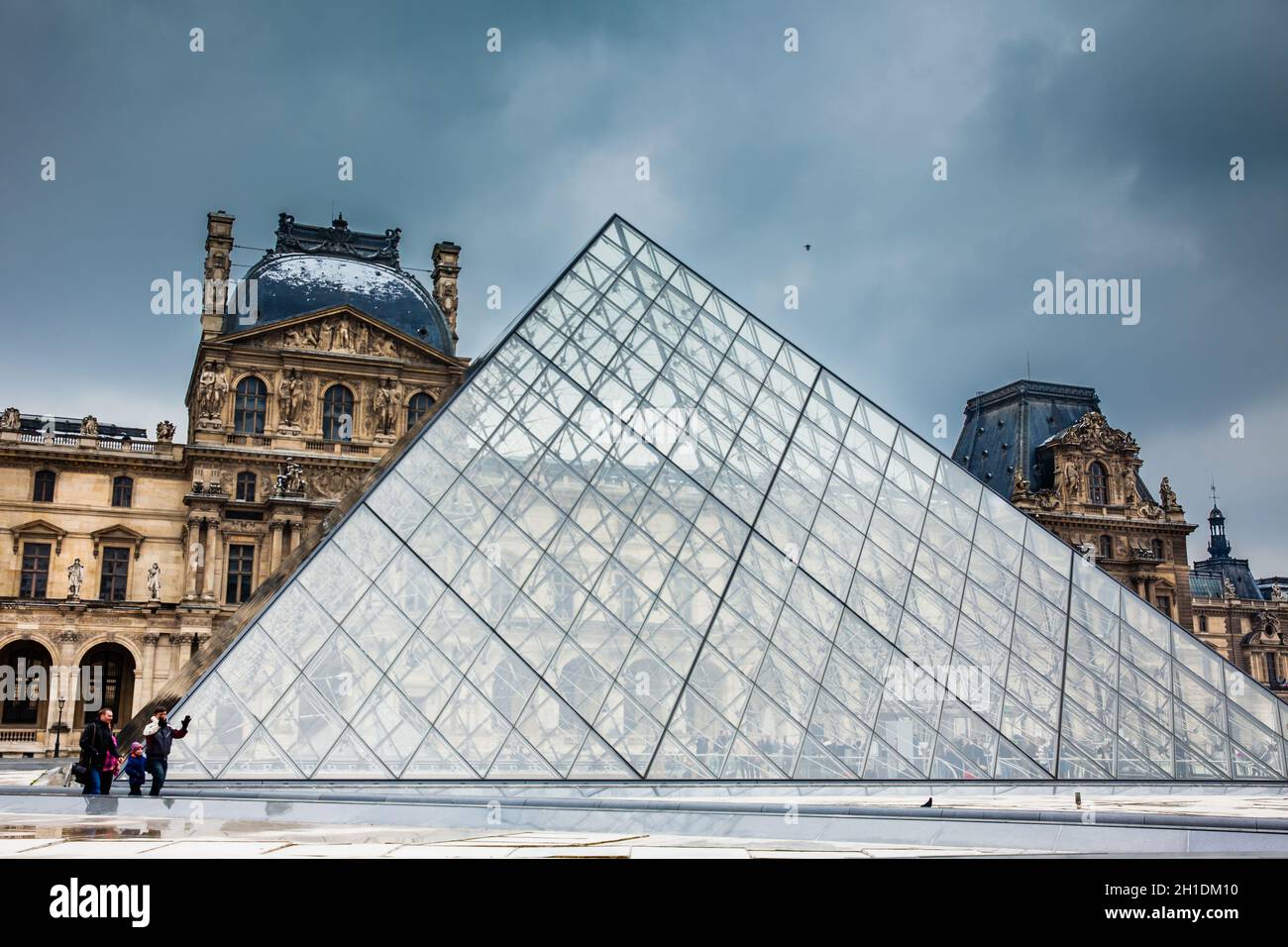 PARIS, FRANCE - MARCH, 2018: The Louvre Museum Pyramid in a freezing ...