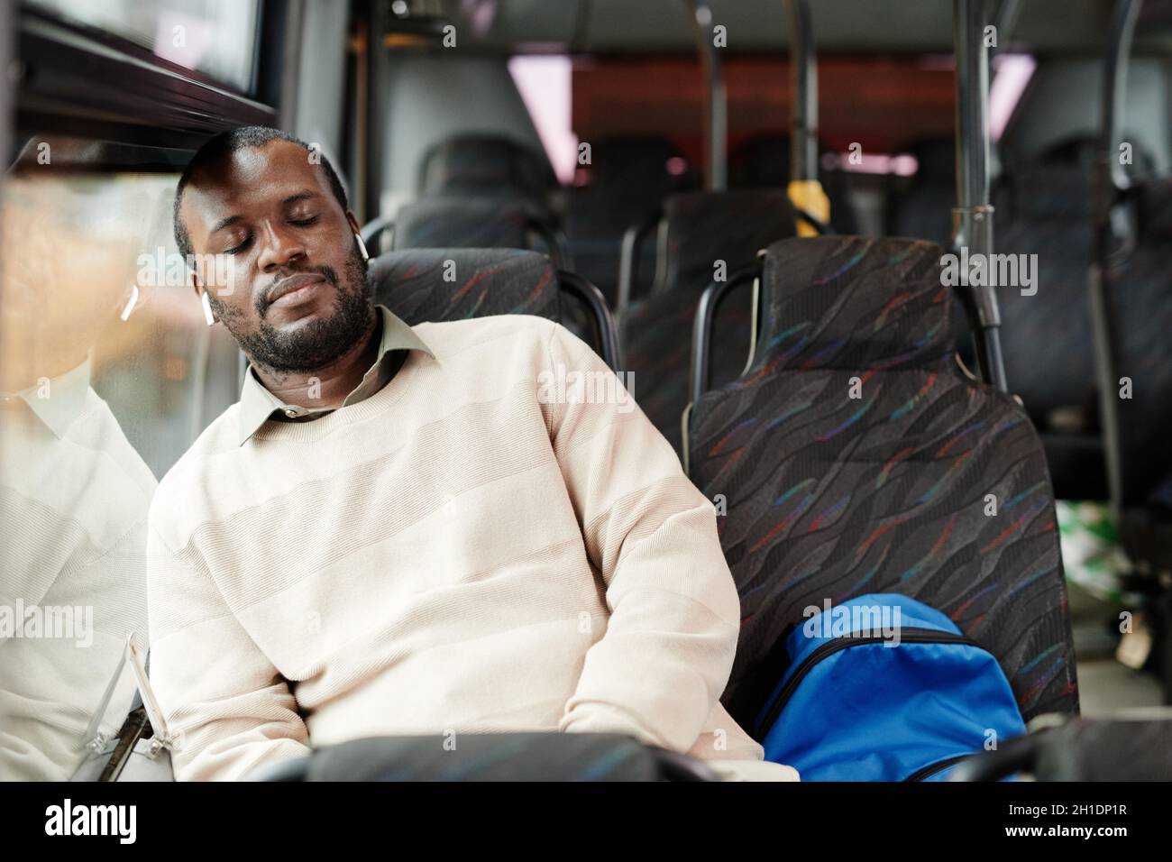 People sleeping on bus hi-res stock photography and images - Alamy