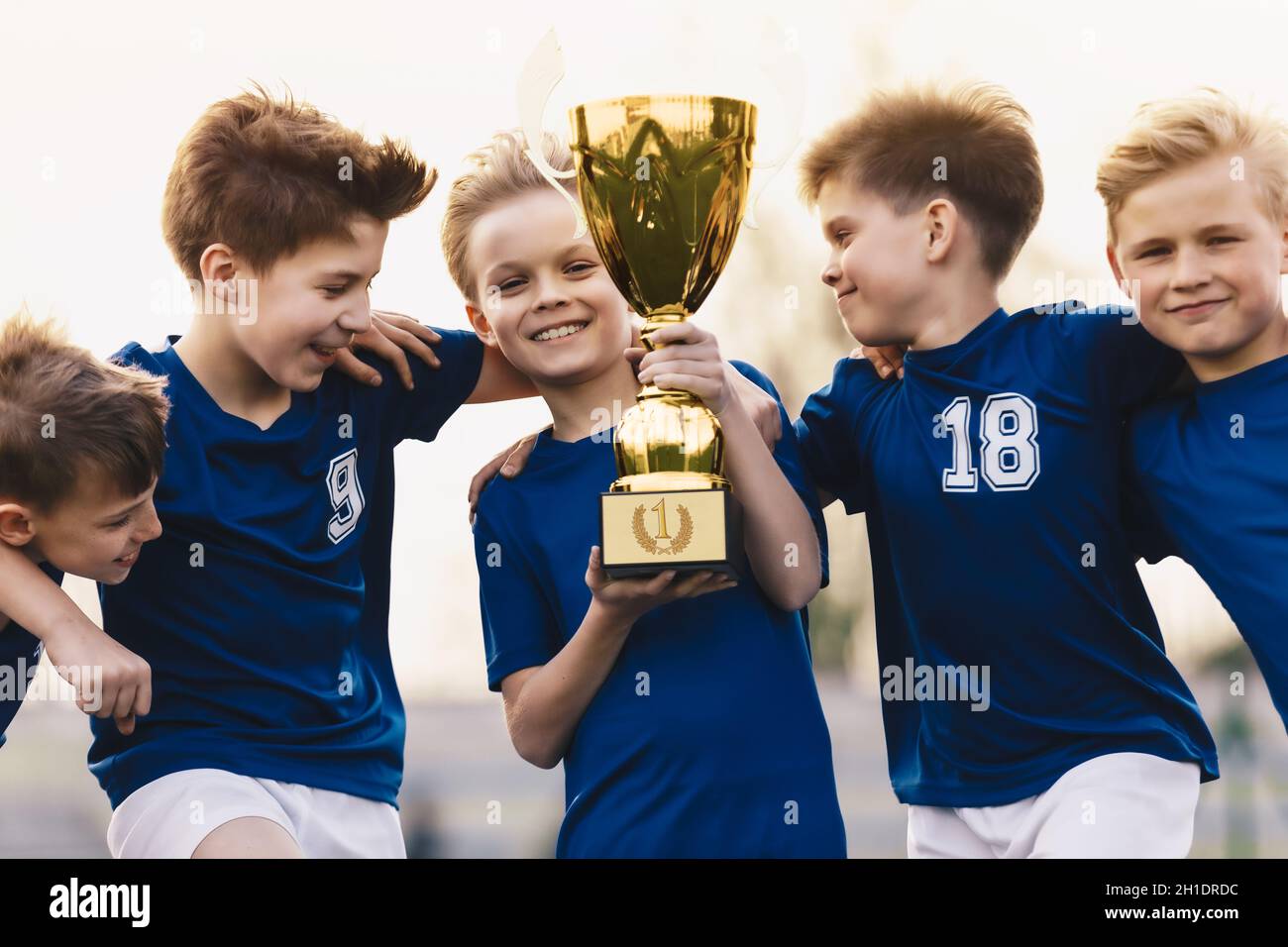 Kids sports team with trophy hi-res stock photography and images - Alamy