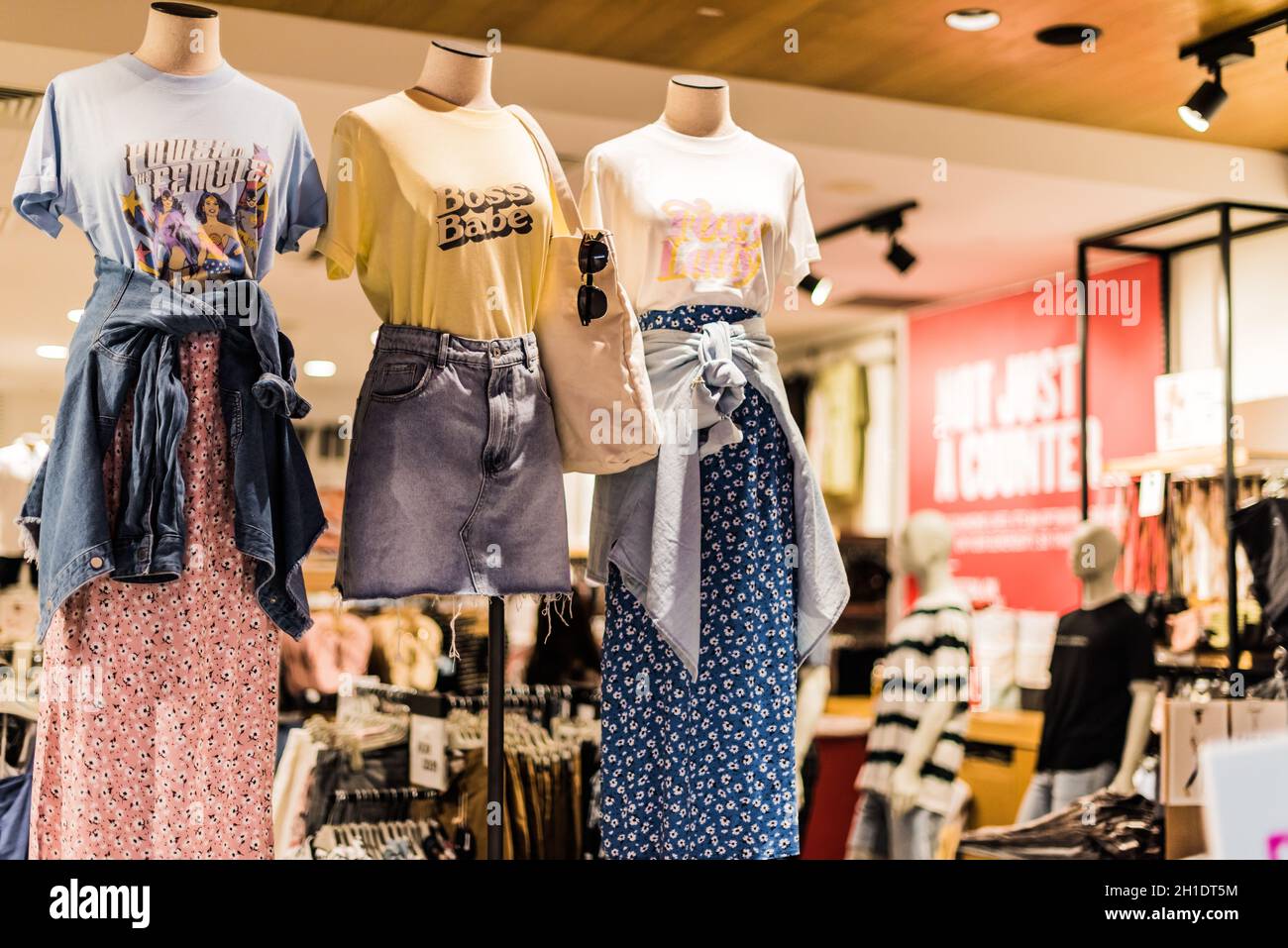 SINGAPORE - MAR 4, 2020: Interior of fashion store with mannequins ...