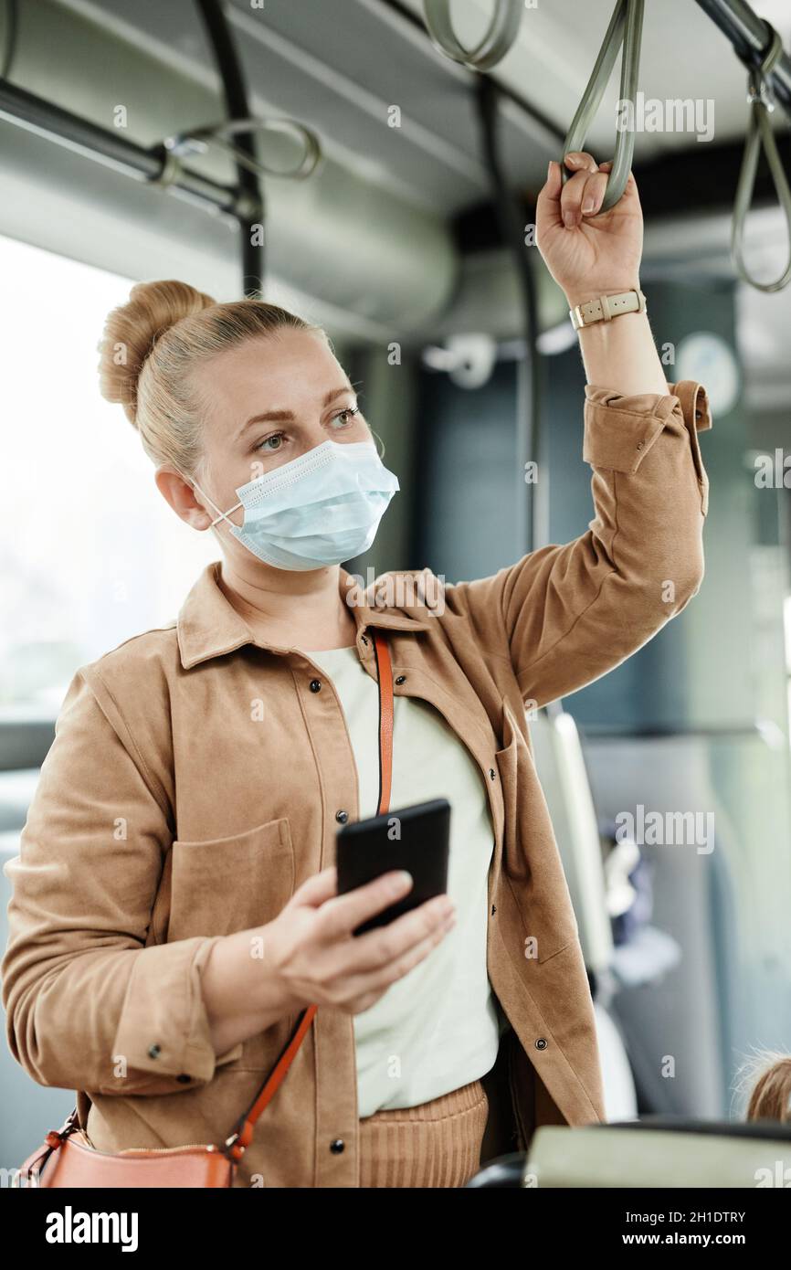 People inside bus wearing hi-res stock photography and images - Alamy