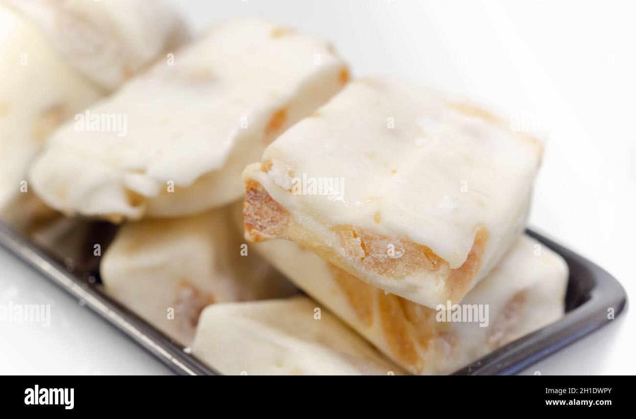 Traditional confections made with sugar or honey, roasted nuts and ...
