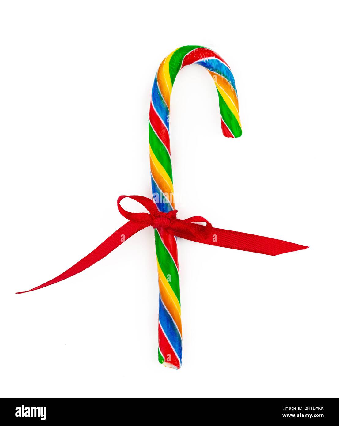 Rainbow colored candy cane isolated on white background Stock Photo - Alamy