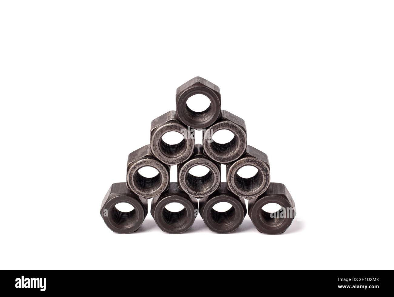 stack of metallic nuts isolated on white background. Heavy hex nut ...