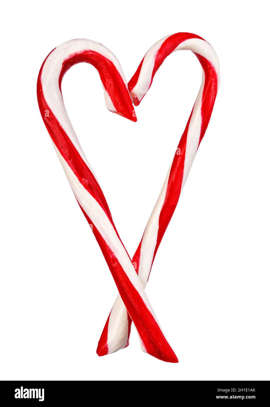 Two candy canes isolated on white background Stock Photo - Alamy