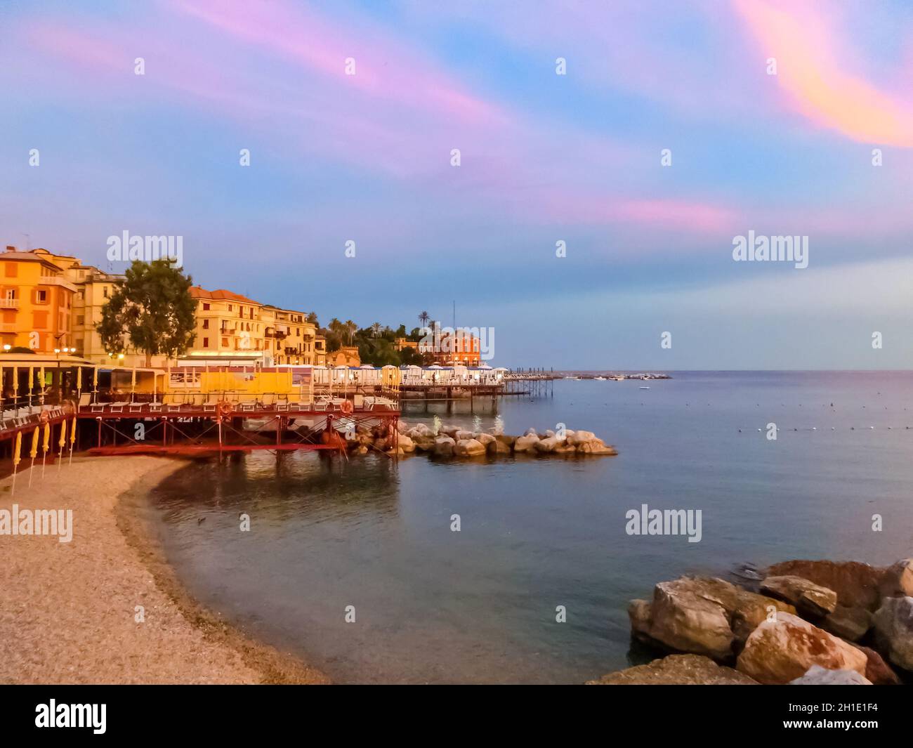 The sand beach at town Rapallo in Liguria, Italy Stock Photo - Alamy