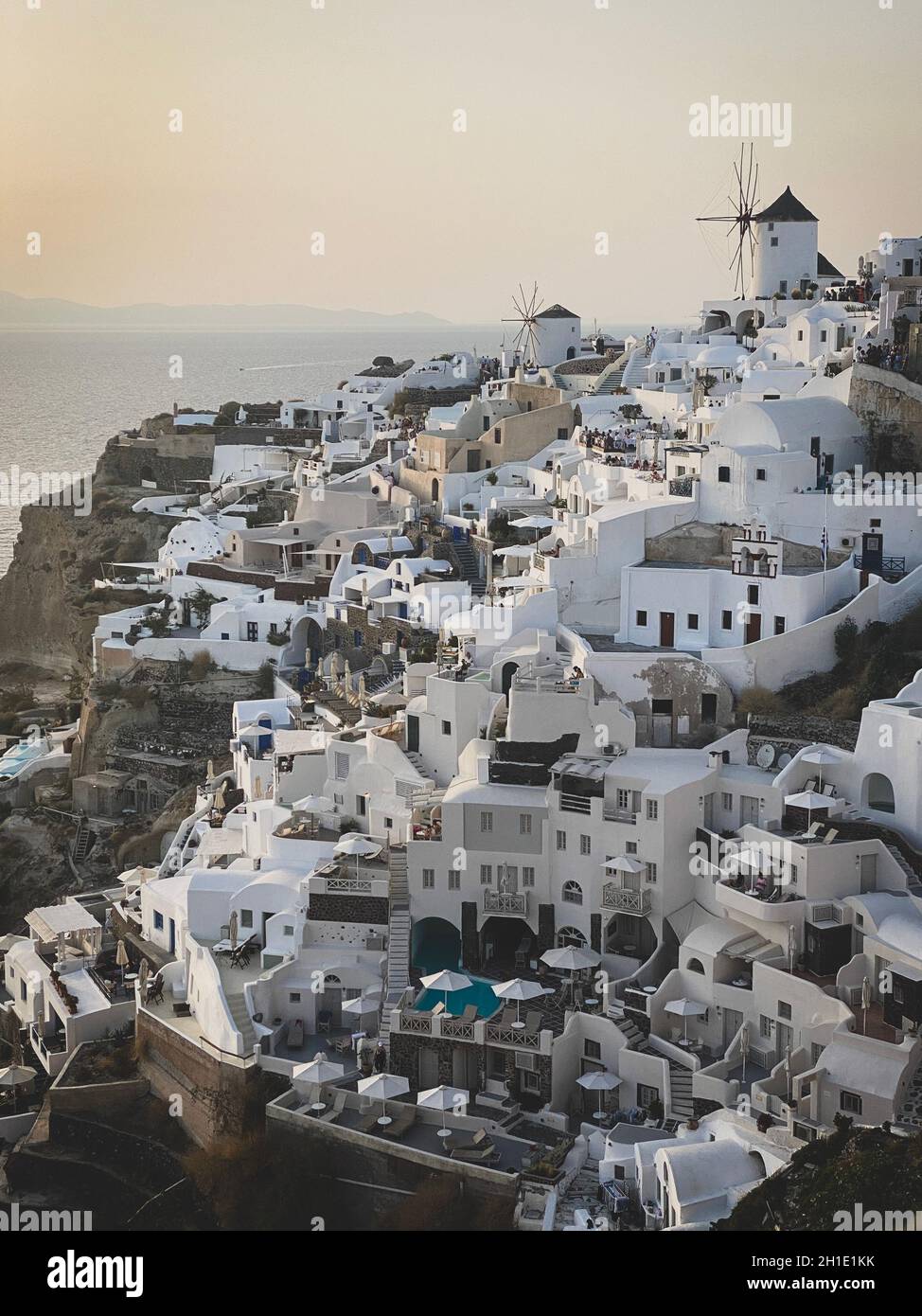 panoramic view of Oia village with traditional white architecture and ...