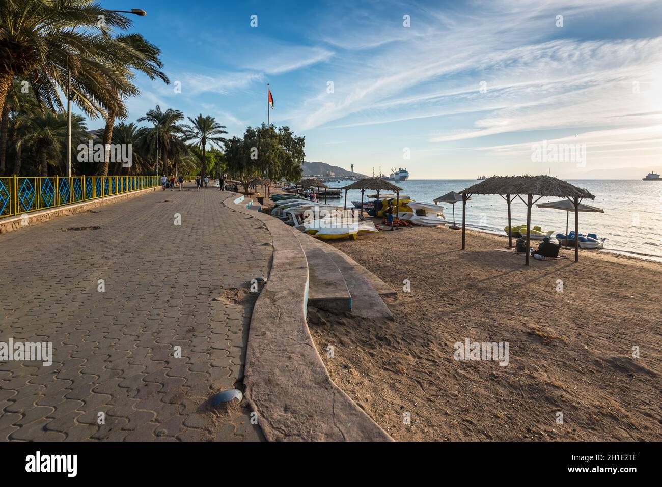 Aqaba, Jordan - November 6, 2017: People walk along the promenade on ...