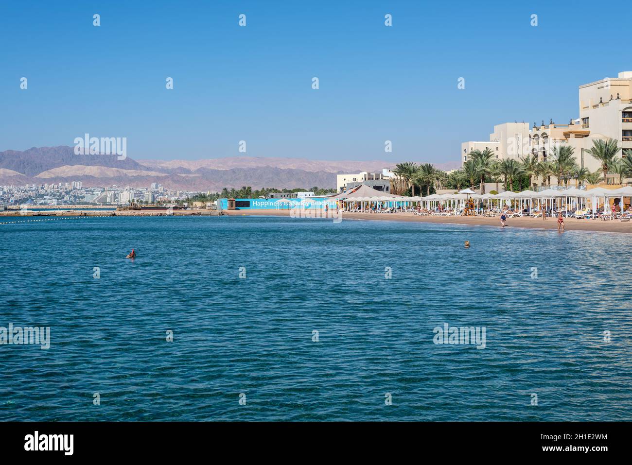 Aqaba, Jordan - November 6, 2017: People relaxing on the beach on the ...
