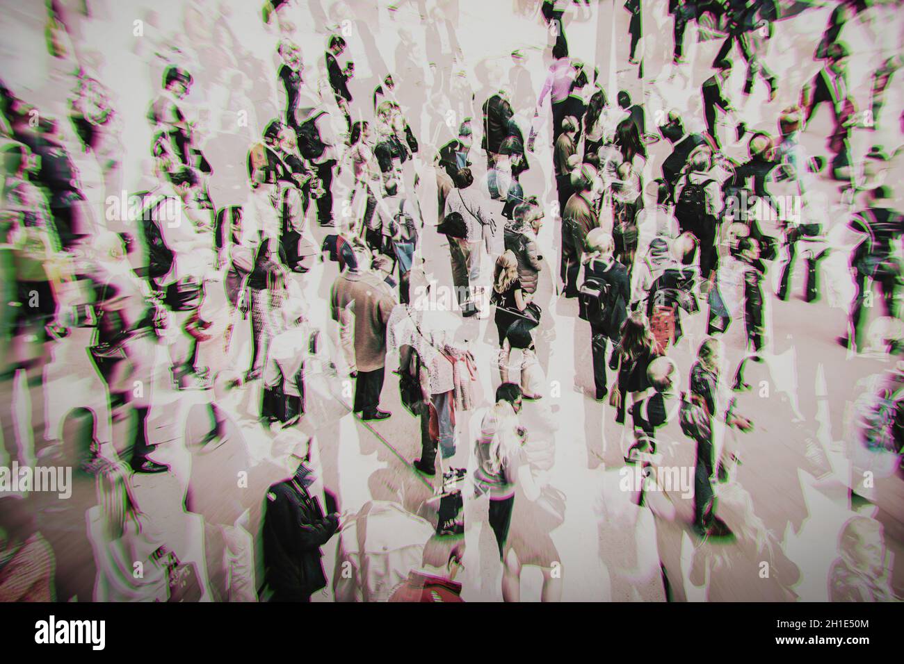 Commuters at Waterloo Station in distorted Cross processed colours ...