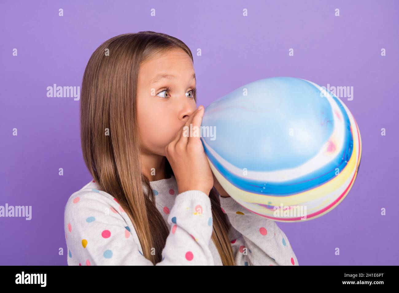 Profile photo of crazy little lady blow inflate air balloon wear crown ...