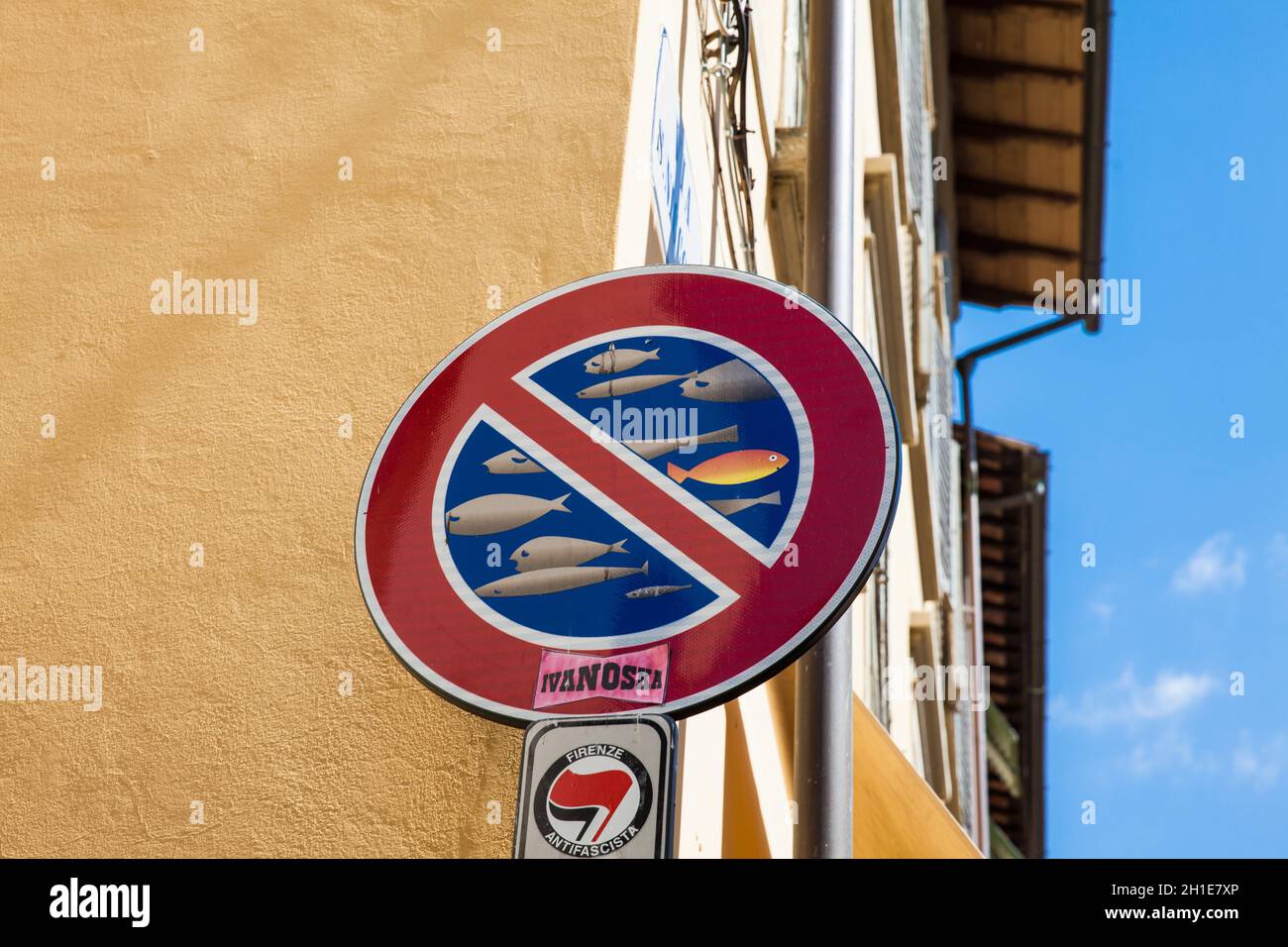 FLORENCE, ITALY - APRIL, 2018: Florence street sign art by Clet Abraham ...