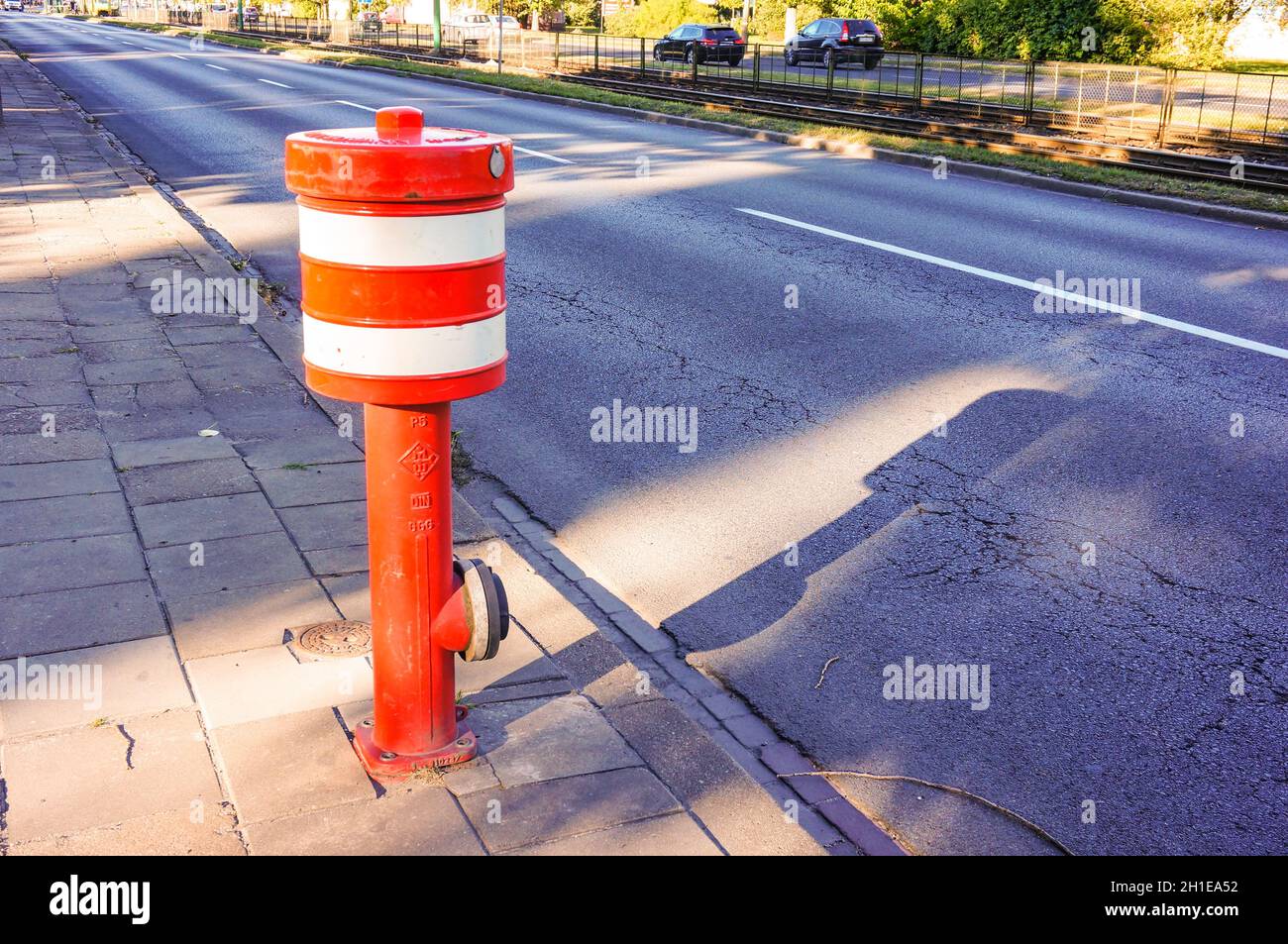 Red water pump on sidewalk hi-res stock photography and images - Alamy