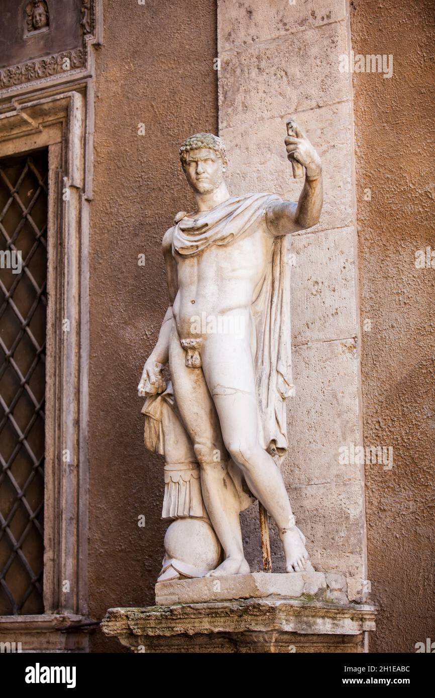 ROME, ITALY - APRIL, 2018: Details of the statues in the Courtyard of ...