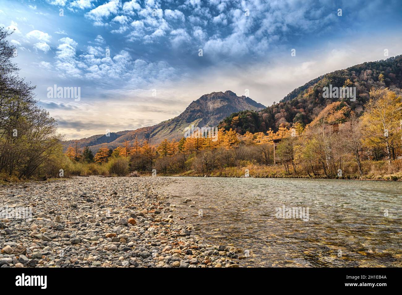 Nature landscape at Kamikochi Japan, autumn fall foliage with pond and ...