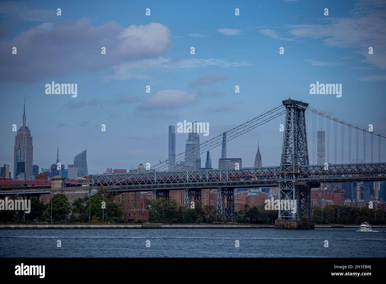 A view of Manhattan Bridge from the East River in New York City Stock ...