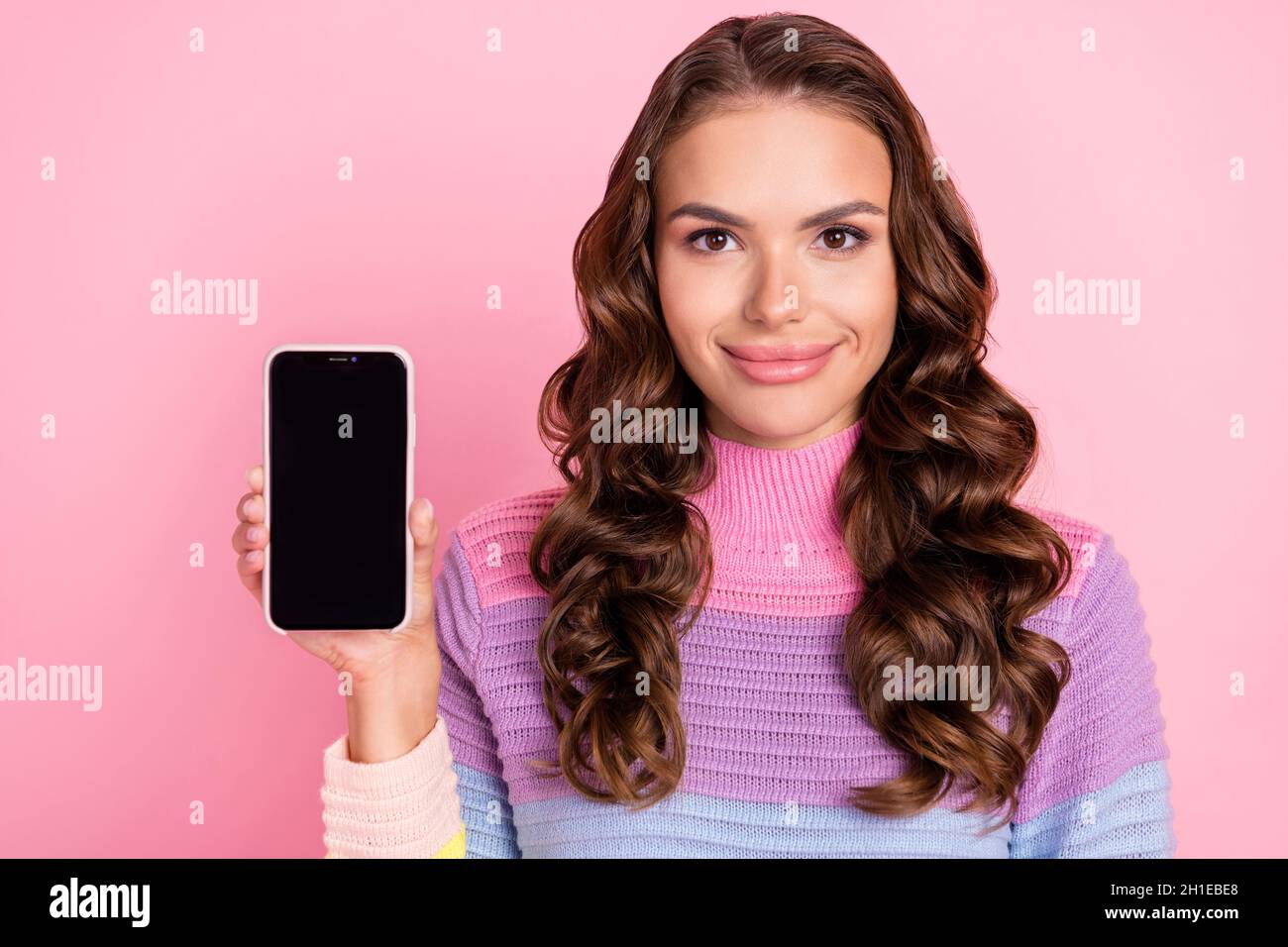 Photo of young girl promoter show cellphone screen ad select choose ...