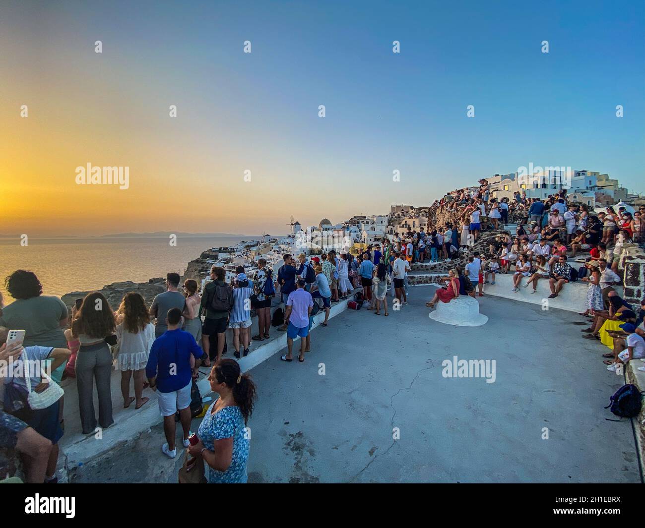 Santorini, Greece, August 2, 2021. Crowd waiting to photograph the ...