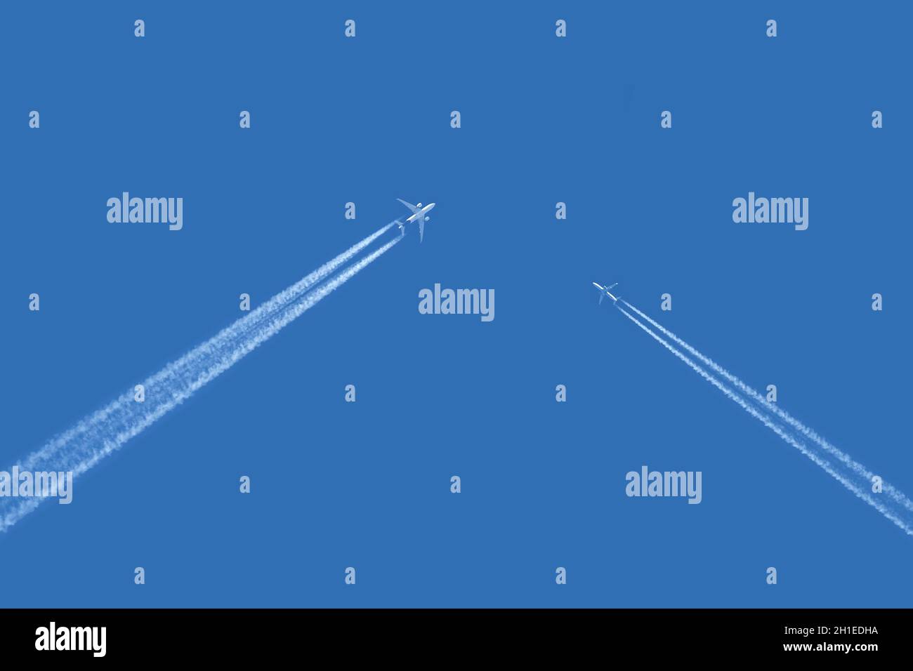 Two large passenger supersonic airliners planes approaching to each ...