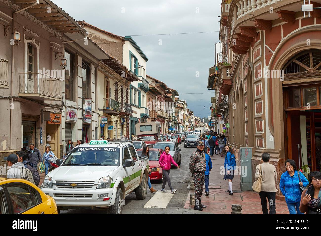 CUENCA, ECUADOR - MAY 07, 2019: Busy urban street with people passing ...