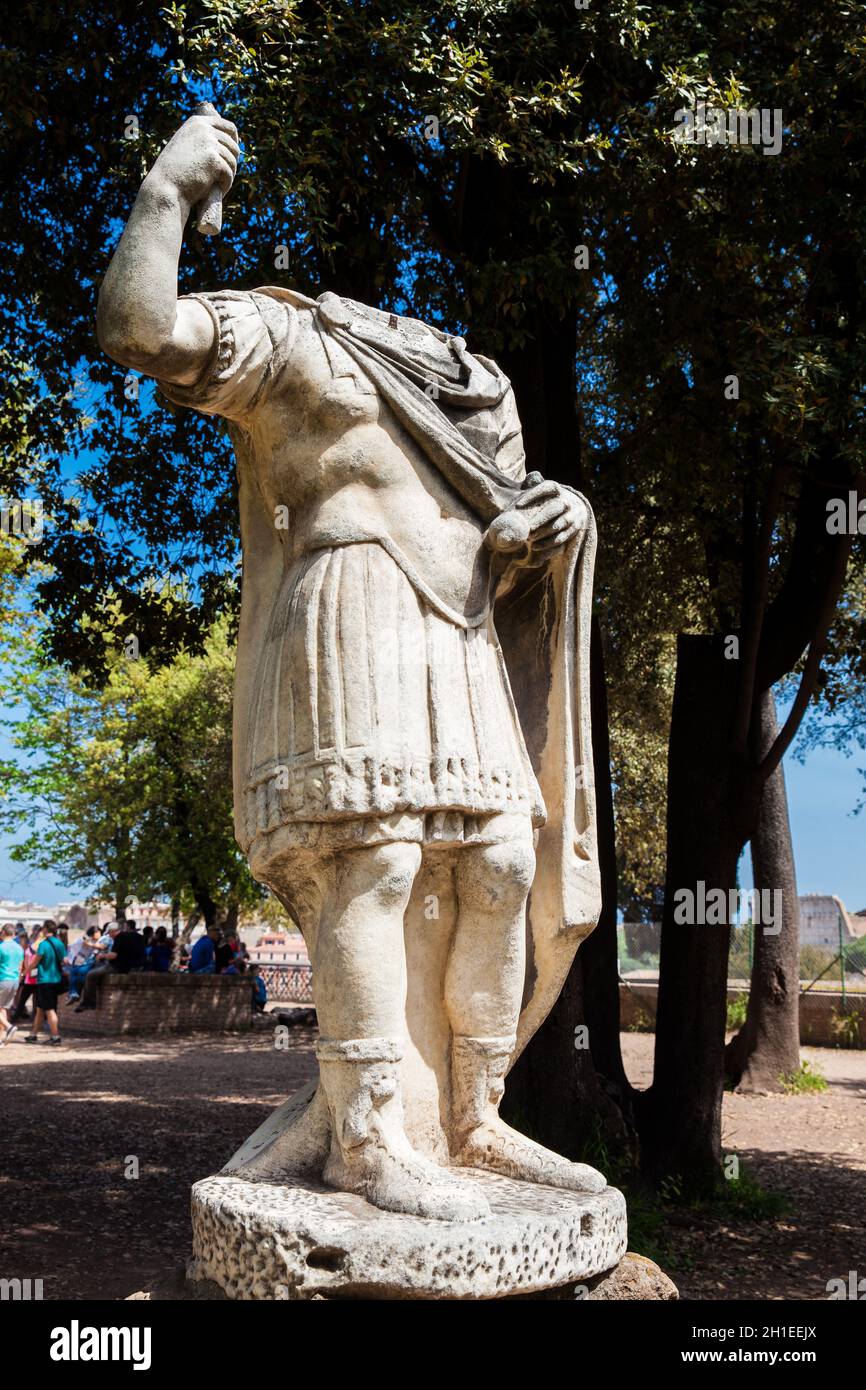 ROME, ITALY - APRIL, 2018: Remains of an ancient Roman statue in the ...