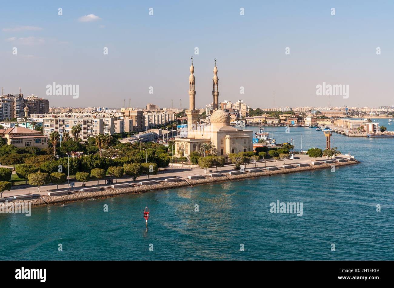 Suez, Egypt - November 5, 2017: An Egyptian Mosque and maritime port at ...