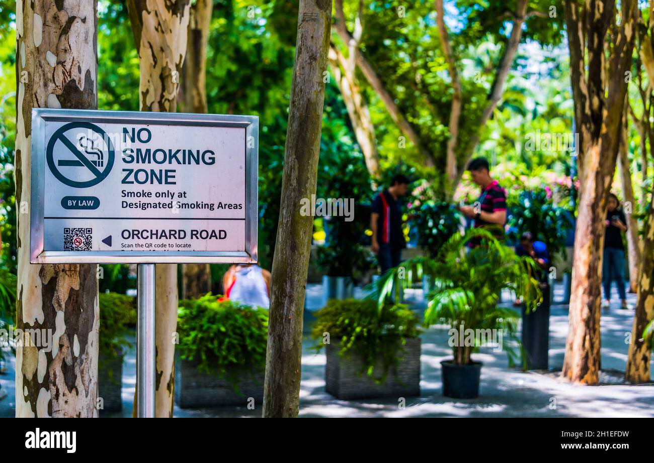SINGAPORE - MAR 2, 2020: No Smoking Zone sign in front of Plaza ...