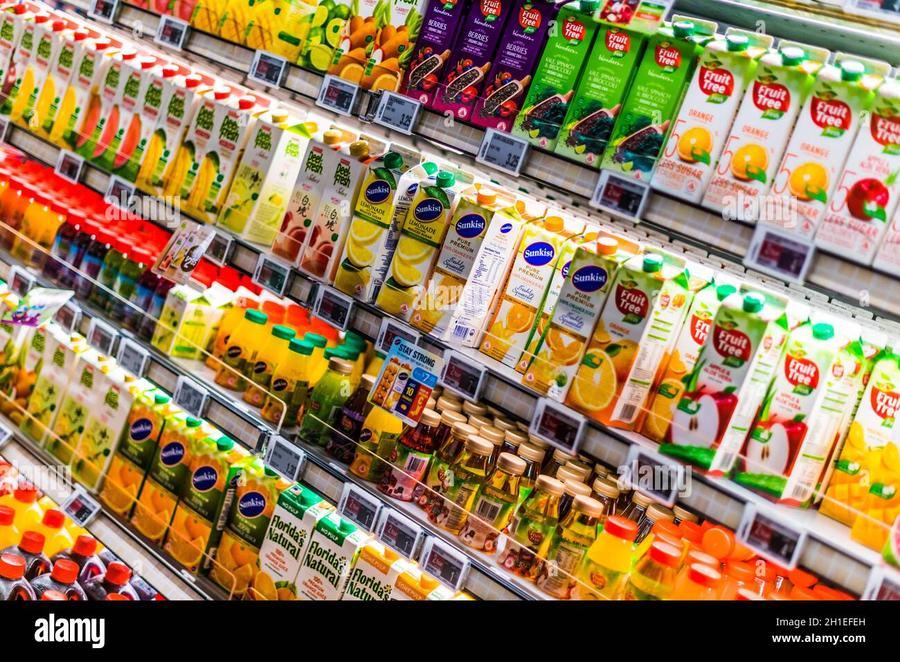 SINGAPORE - MAR 3, 2020: Juice boxes and cold drinks put up for sale in ...