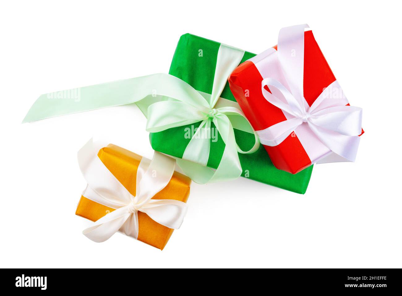Three beautiful wrapped gifts isolated on white background Stock Photo ...