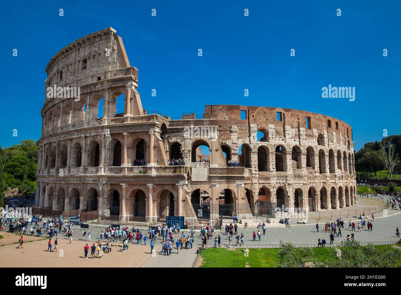 ROME, ITALY - APRIL, 2018: Tourists visiting the famous Colosseum in ...