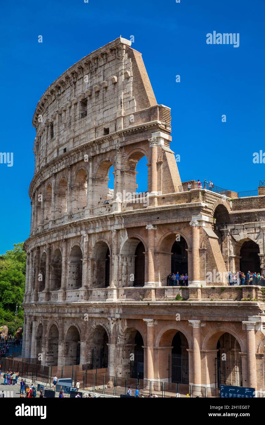 ROME, ITALY - APRIL, 2018: Tourists visiting the famous Colosseum in ...