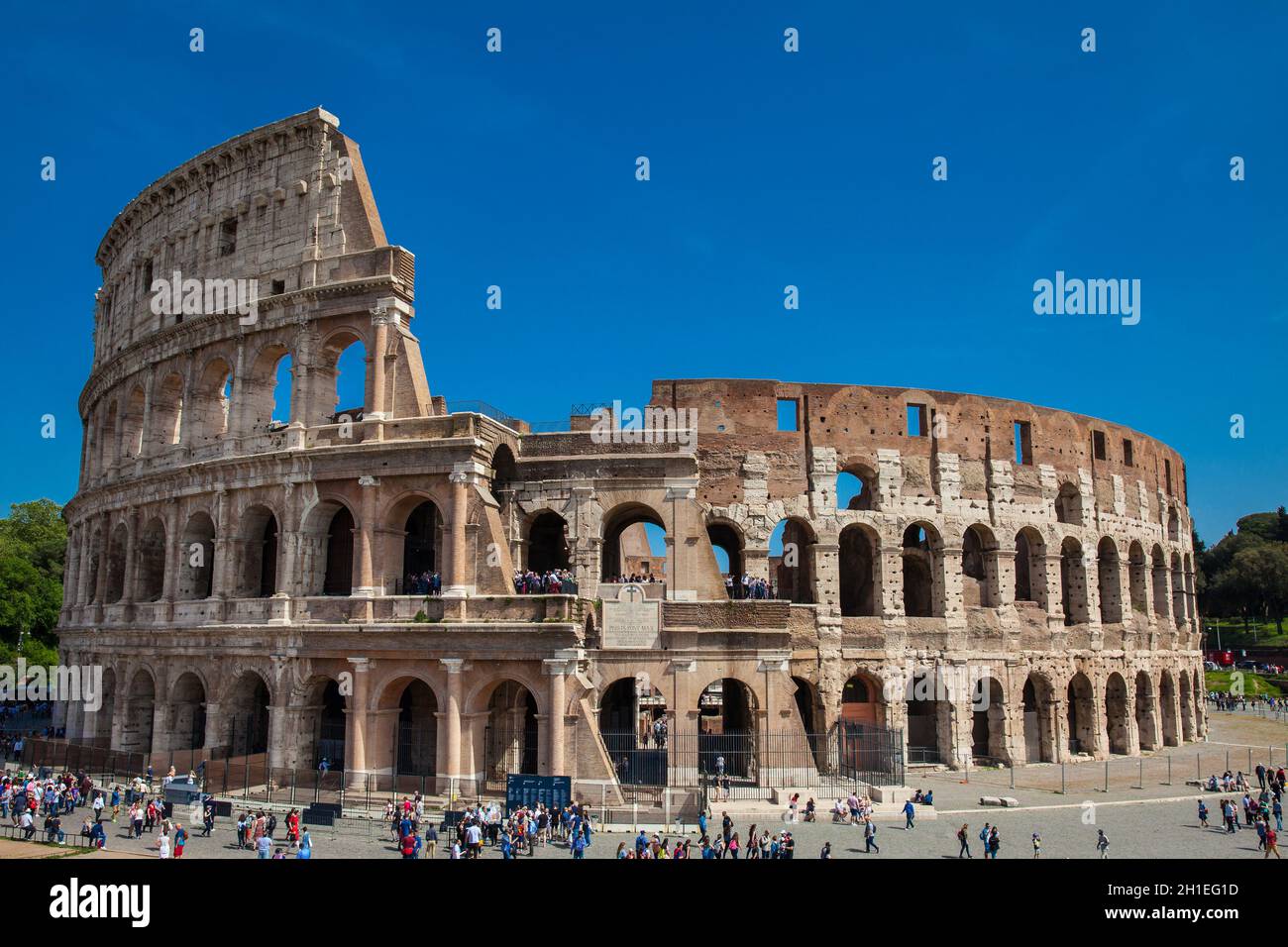 ROME, ITALY - APRIL, 2018: Tourists visiting the famous Colosseum in ...