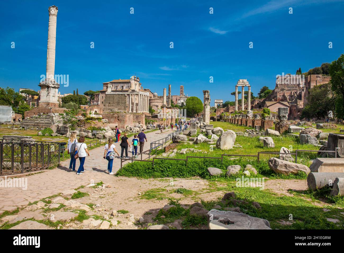 ROME, ITALY - APRIL, 2018: Tourists visiting the Roman Forum in a ...