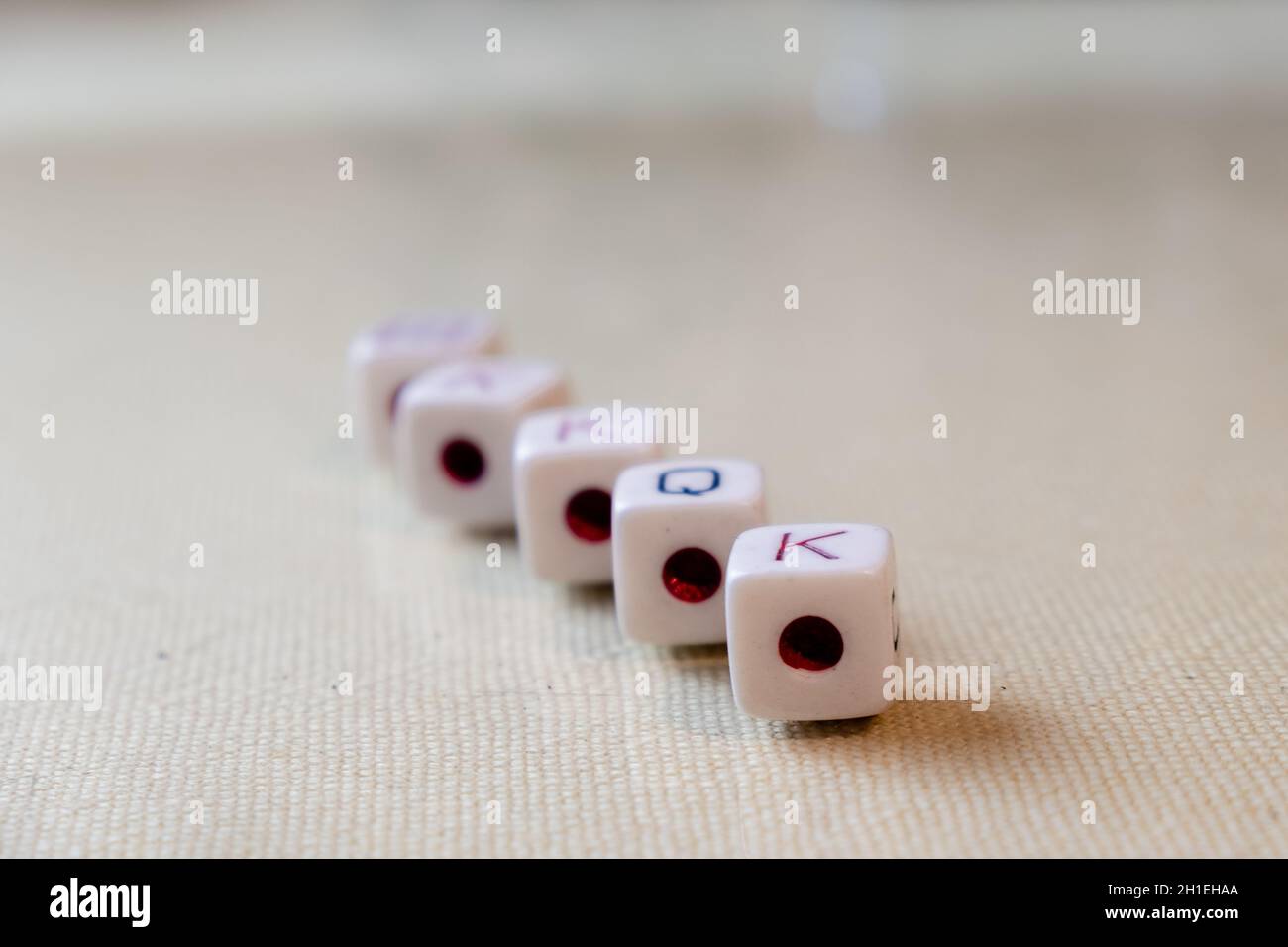 Row of five dice on white background with aces in the foreground Stock ...