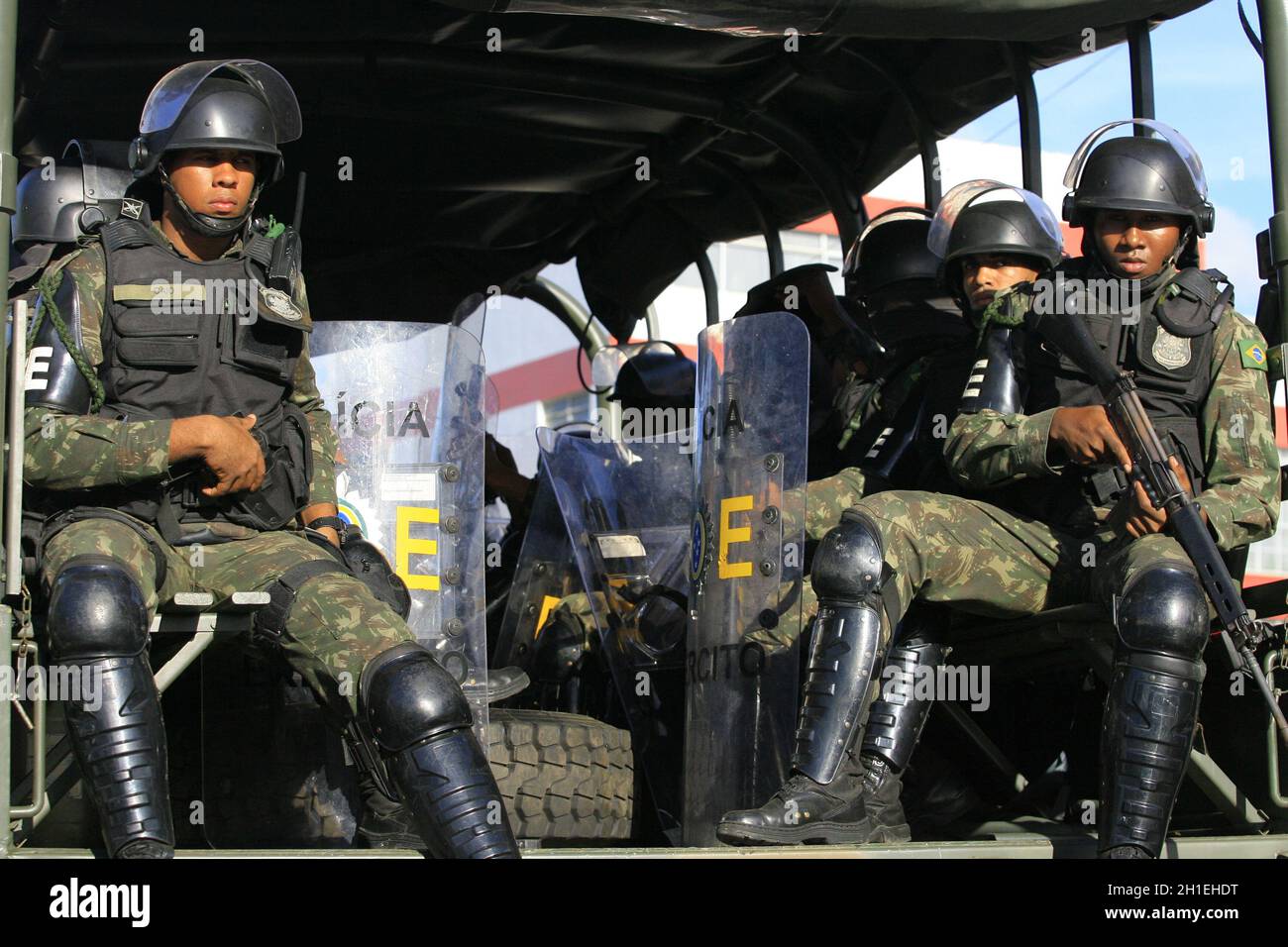 buerarema, bahia / brazil - february 14, 2014: Army soldiers patrol the ...