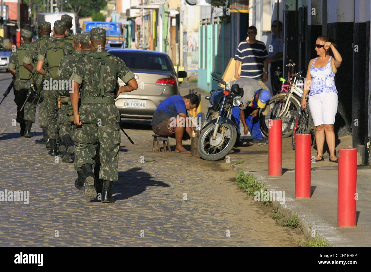 buerarema, bahia / brazil - february 14, 2014: Army soldiers patrol the ...