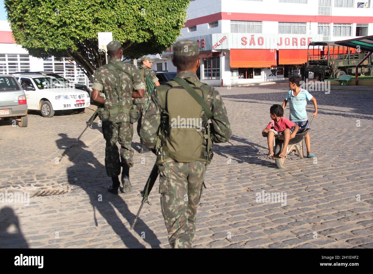 buerarema, bahia / brazil - february 14, 2014: Army soldiers patrol the ...